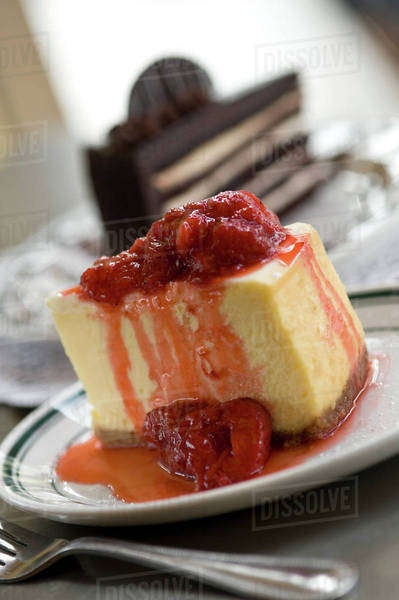 Cheesecake with strawberry topping - Royalty-free Stock Photo | Dissolve