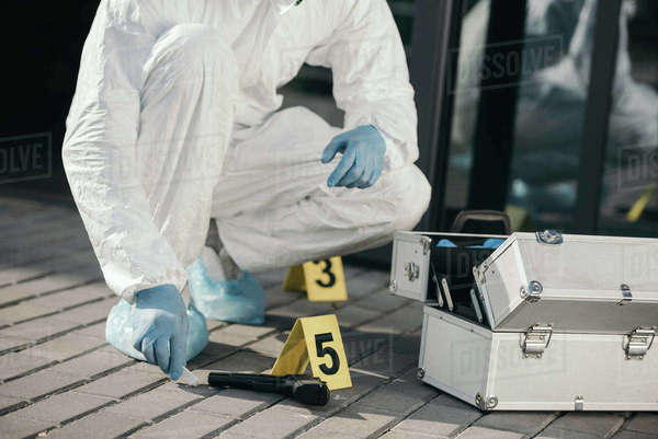 Cropped View Of Male Criminologist In Protective Suit And Latex Gloves