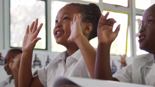 School kids counting with fingers at an elementary school - 4K Royalty ...