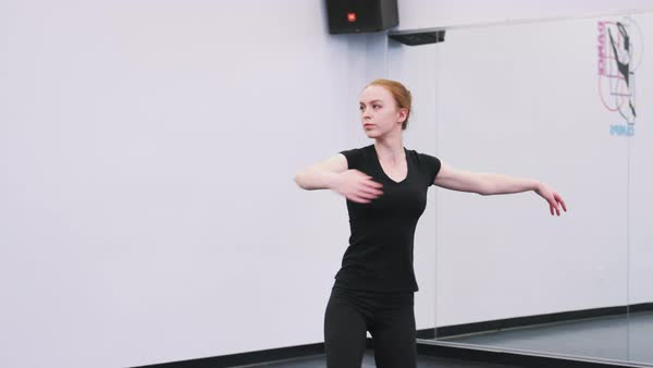 Female Student At Performing Arts School Rehearsing Ballet In Dance ...