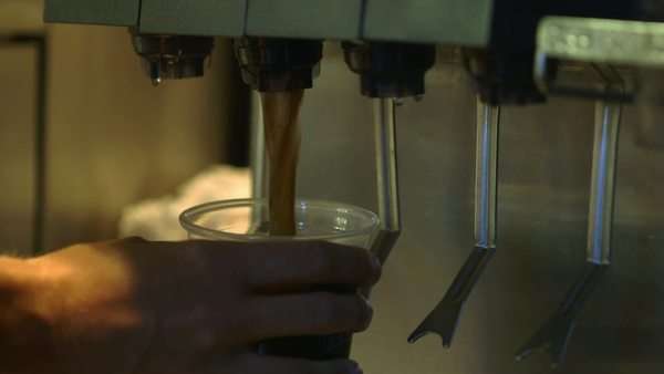 Soft drink dispensing from a soda fountain dispenser popular in fast ...