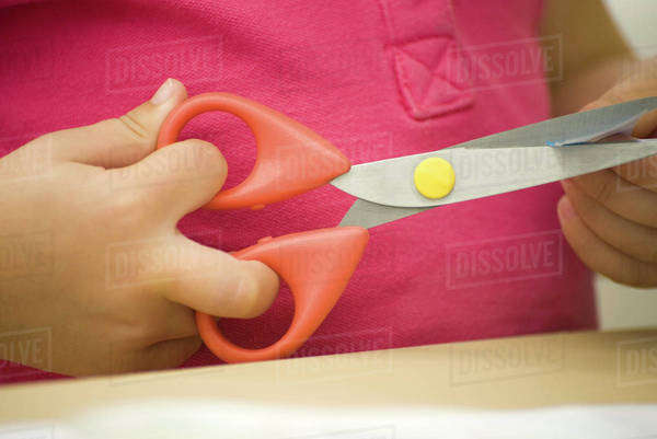 Child using scissors, cropped view of hands - Royalty-free Stock Photo ...