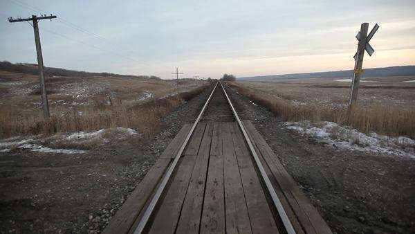 Train tracks receding to a vanishing point - Stock Video Footage - Dissolve