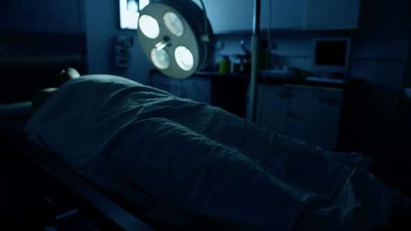 Dead male body laid out on an autopsy table - HD Royalty-free Stock ...