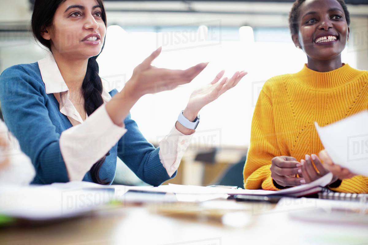 Businesswomen talking in conference room meeting - Royalty-free Stock ...