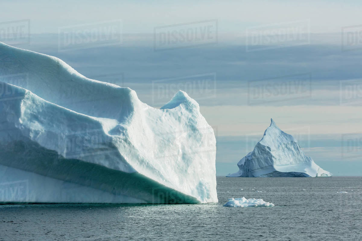 Iceberg formations on Atlantic Ocean Greenland - Stock Photo - Dissolve