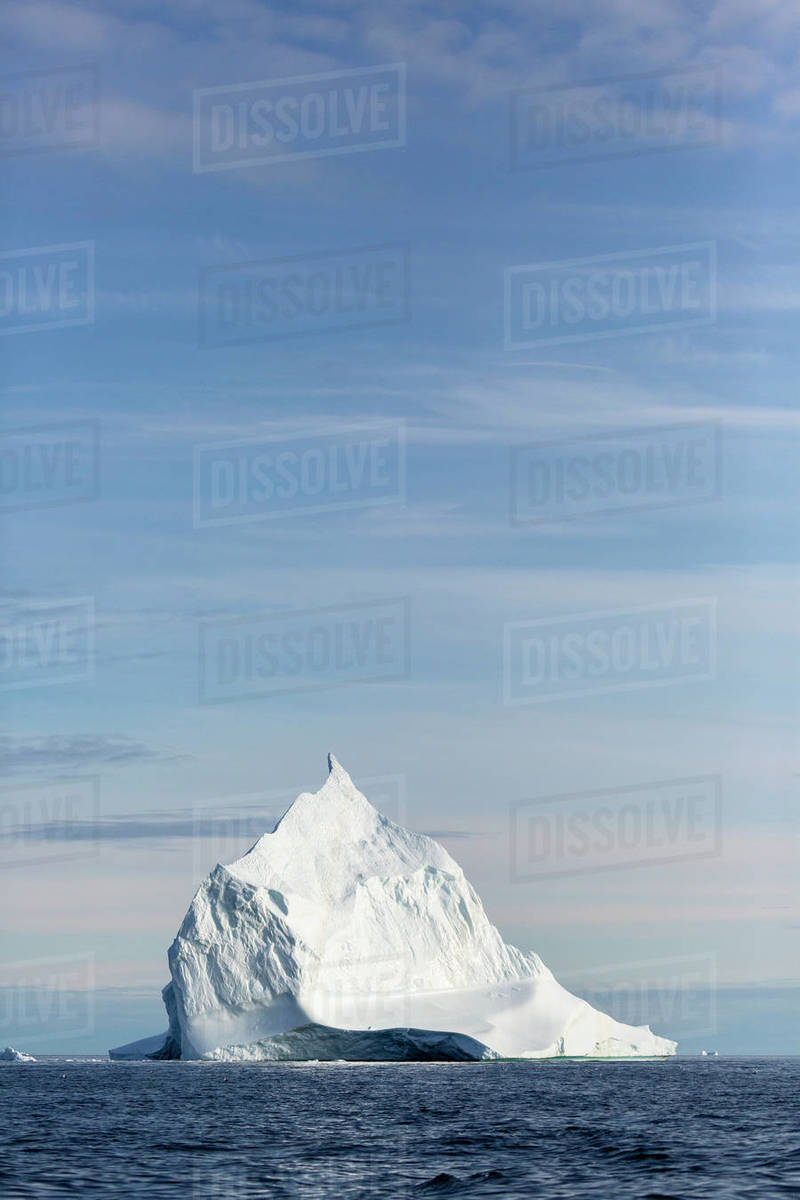 Majestic iceberg formation on sunny blue Atlantic Ocean Greenland ...