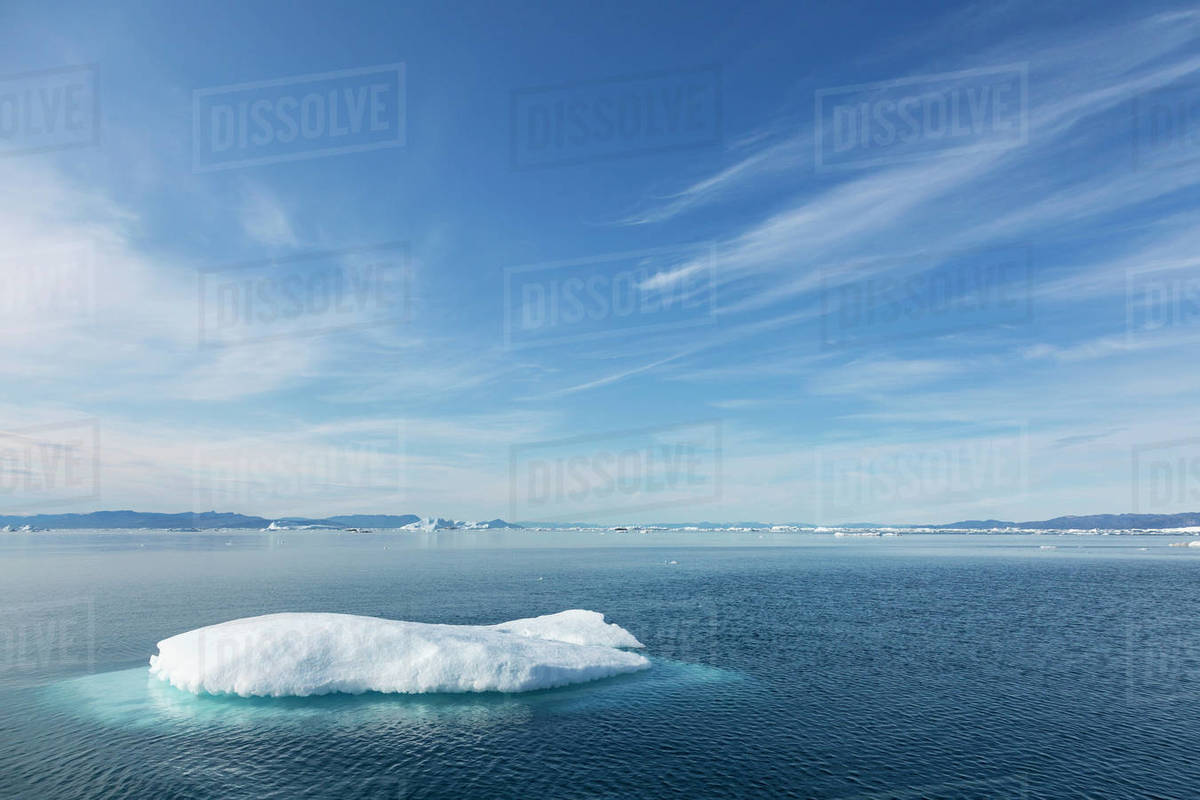 Melting polar ice on sunny blue Atlantic Ocean Greenland - Royalty-free ...