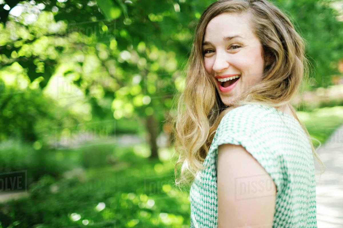 Portrait of smiling woman - Royalty-free Stock Photo | Dissolve