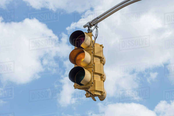 Traffic light against sky - Royalty-free Stock Photo | Dissolve