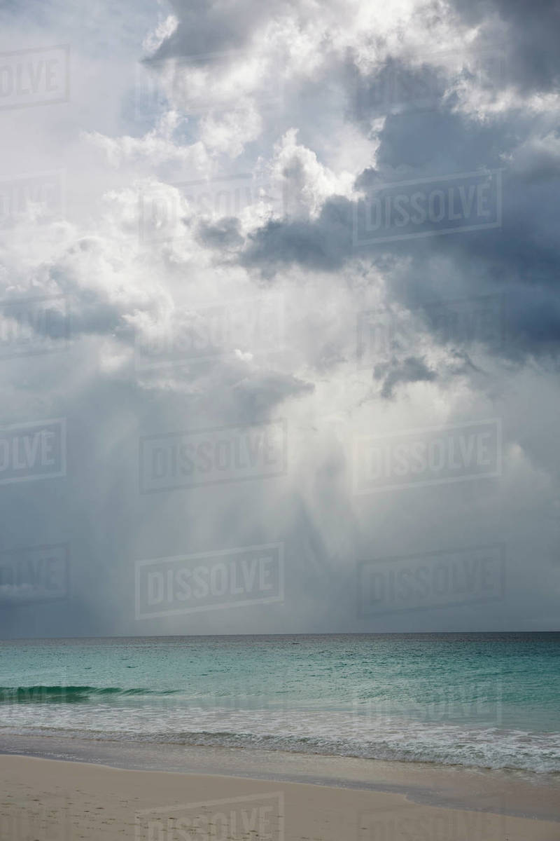 Beach under overcast sky - Royalty-free Stock Photo | Dissolve