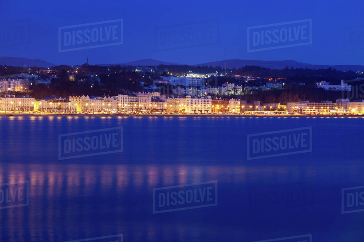 Buildings at night along waterfront of Douglas, Isle of Man - Royalty ...
