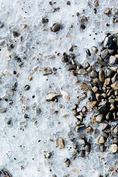 Ice over pebbles - Royalty-free Stock Photo | Dissolve