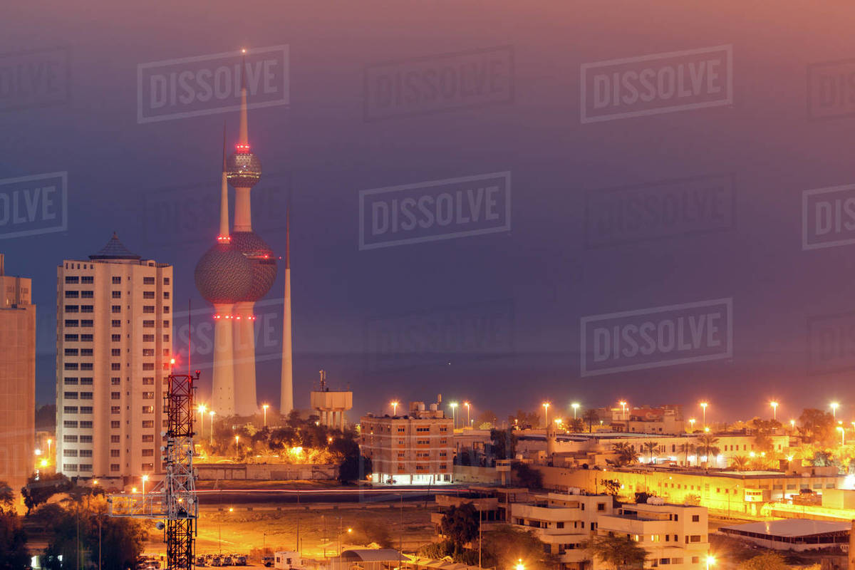Skyline with Kuwait Towers at night in Kuwait City, Kuwait - Royalty ...
