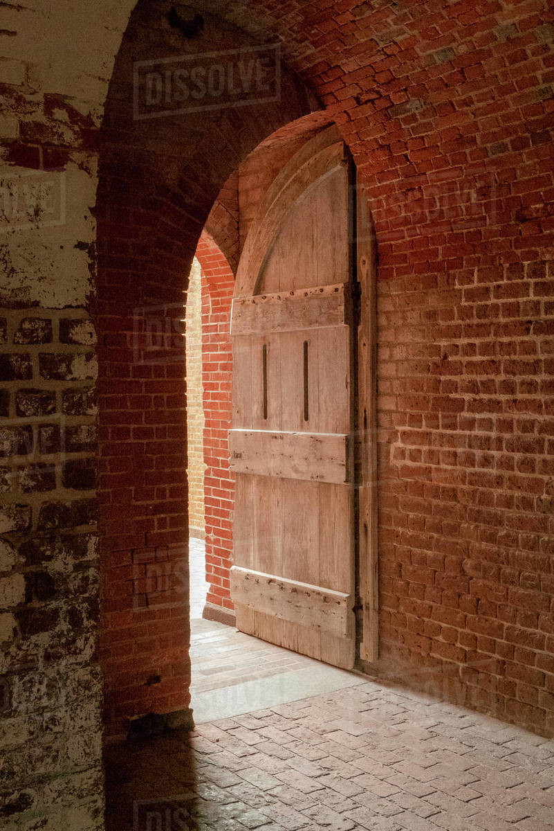 Open door and brick wall - Royalty-free Stock Photo | Dissolve