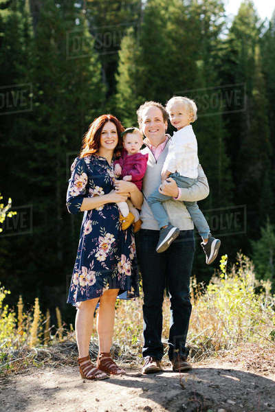 Family by forest - Stock Photo - Dissolve