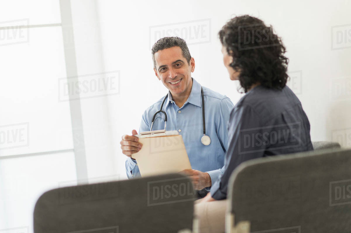 Doctor with patient - Royalty-free Stock Photo | Dissolve