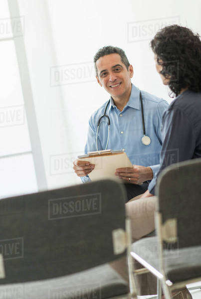 Doctor with patient - Royalty-free Stock Photo | Dissolve