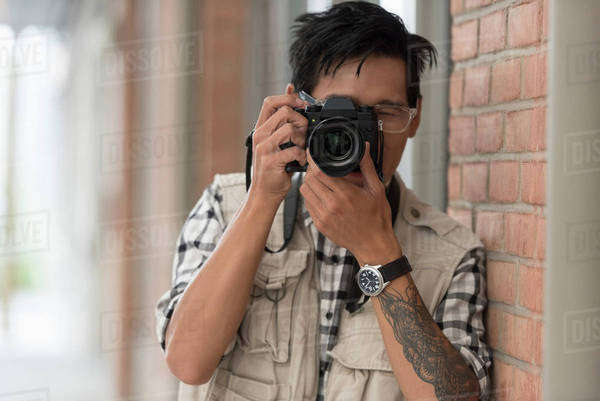 Man photographing - Royalty-free Stock Photo | Dissolve