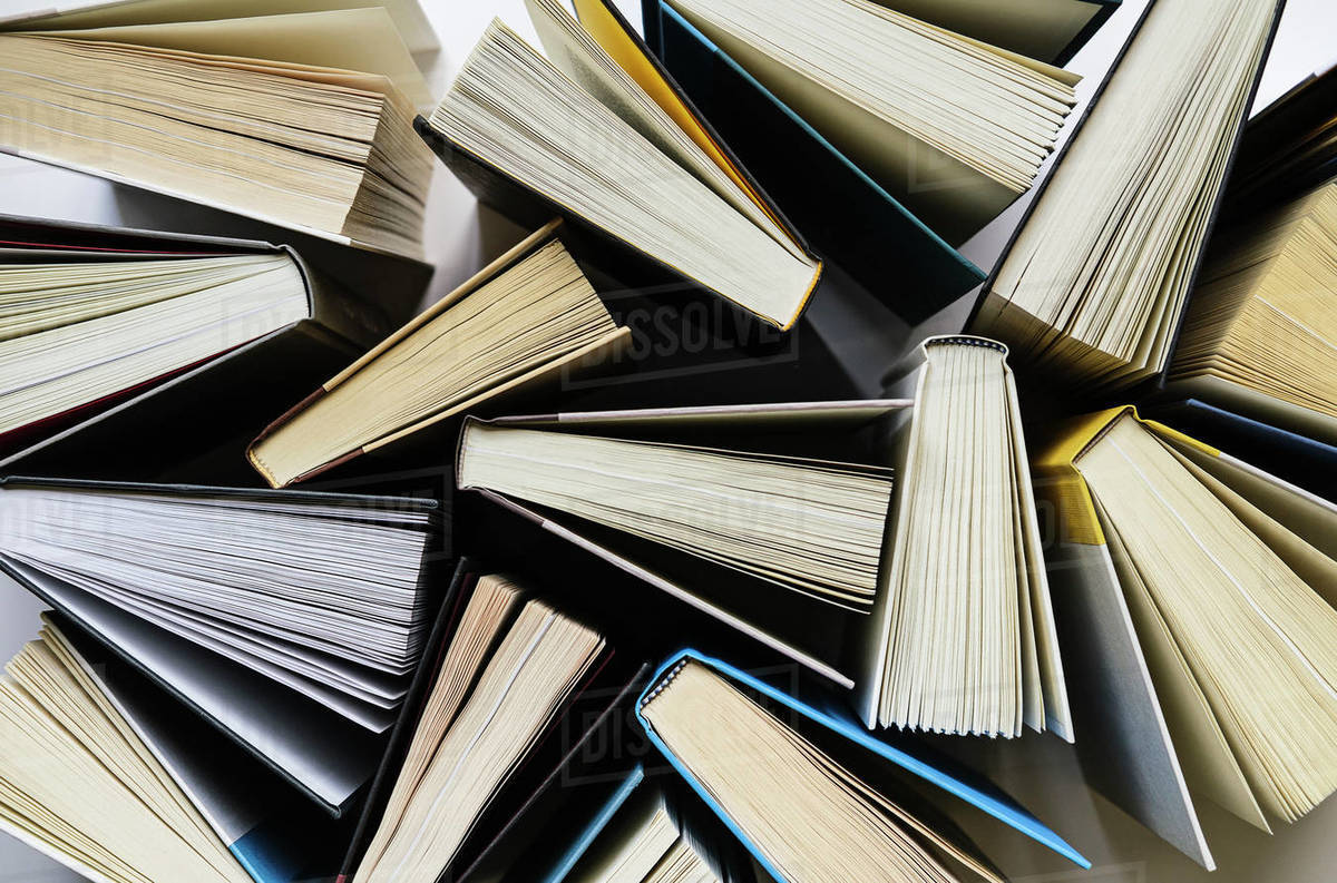 Books viewed from directly above - Royalty-free Stock Photo | Dissolve