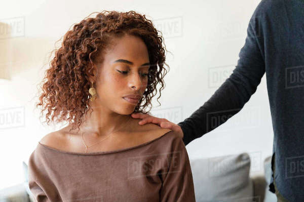 Person with their hand on sad woman's shoulder - Royalty-free Stock ...