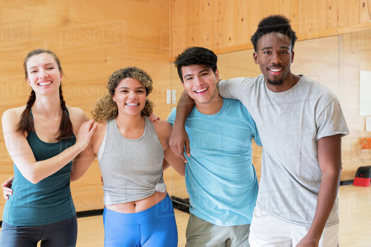 Friends together at gym - Royalty-free Stock Photo | Dissolve