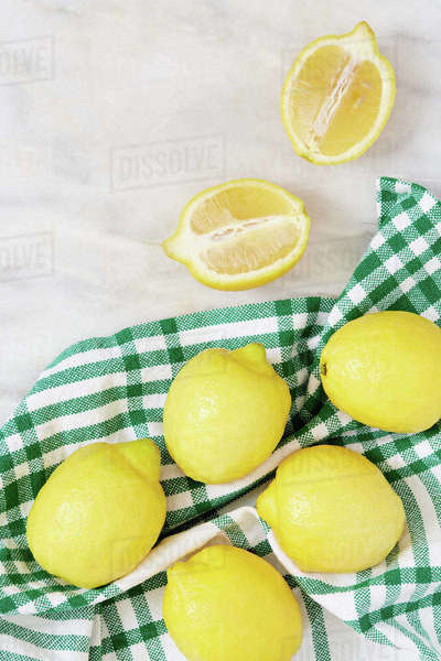 Fresh lemon on green cloth - Royalty-free Stock Photo | Dissolve