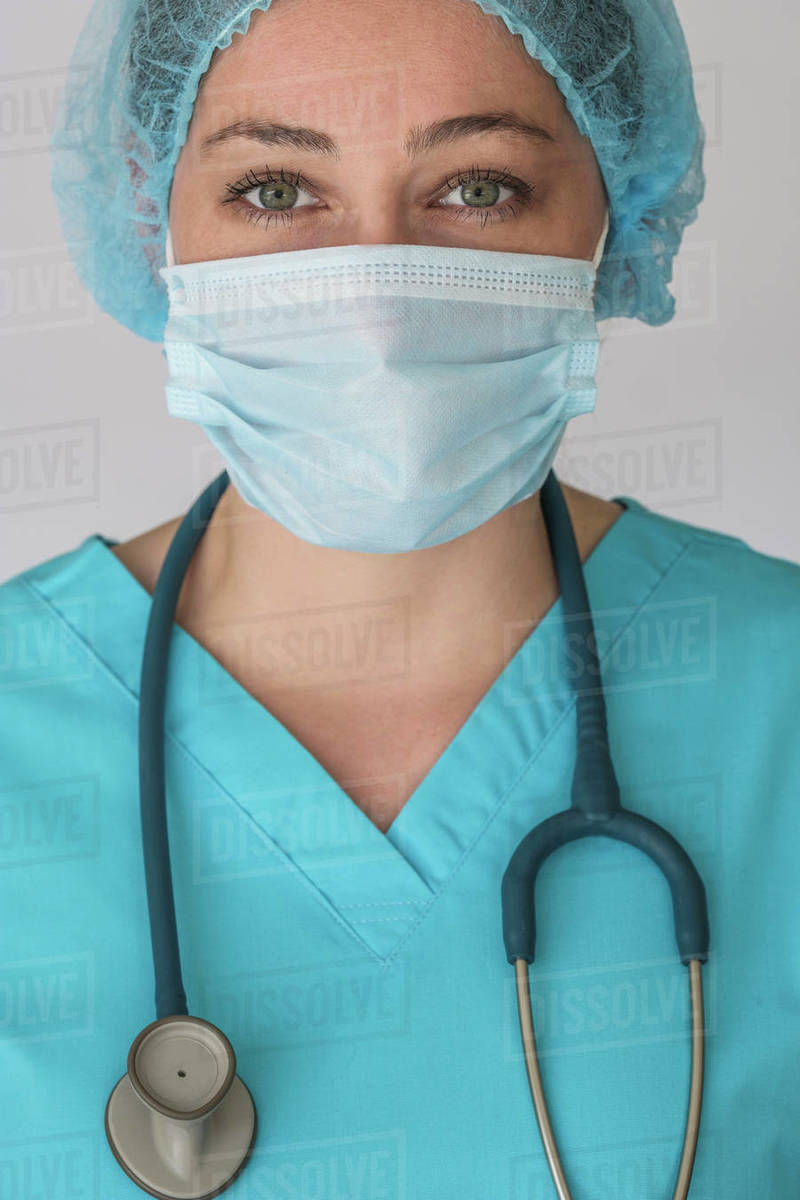 Portrait of nurse in face mask - Royalty-free Stock Photo | Dissolve