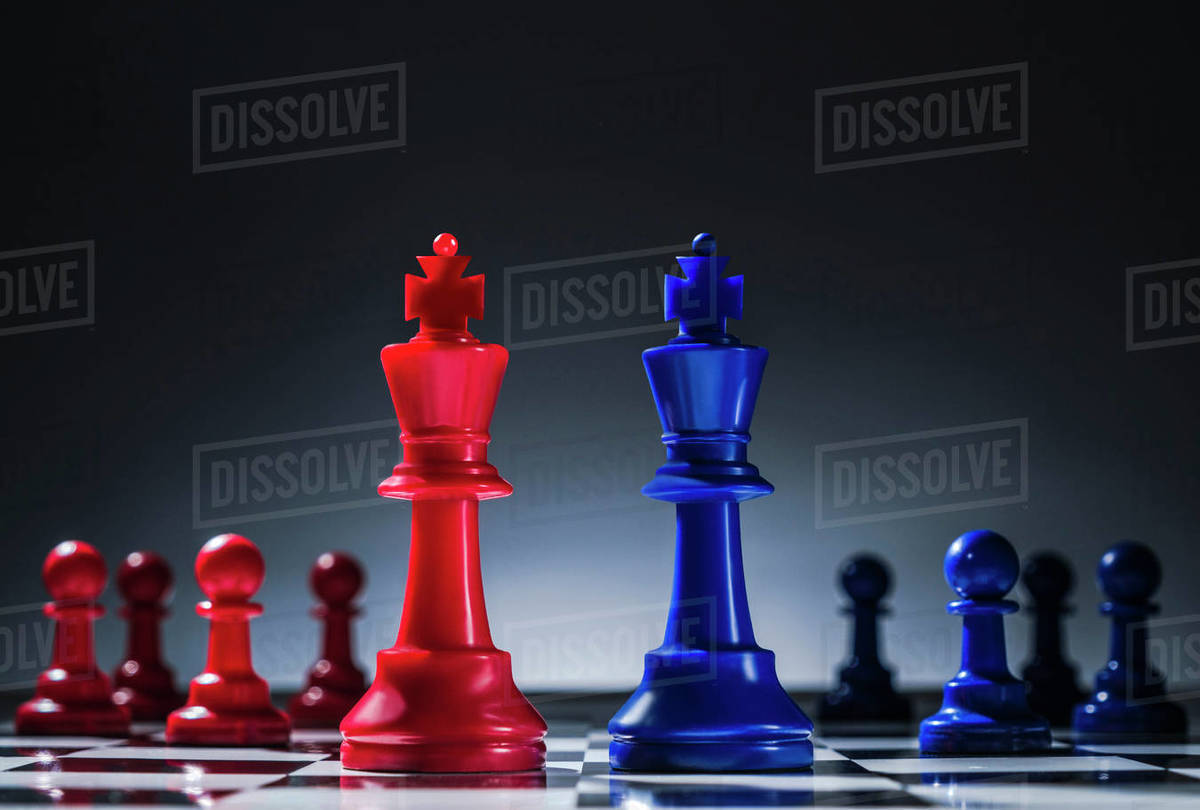 Studio shot of red and blue chess pawns symbolizing US Democratic and ...
