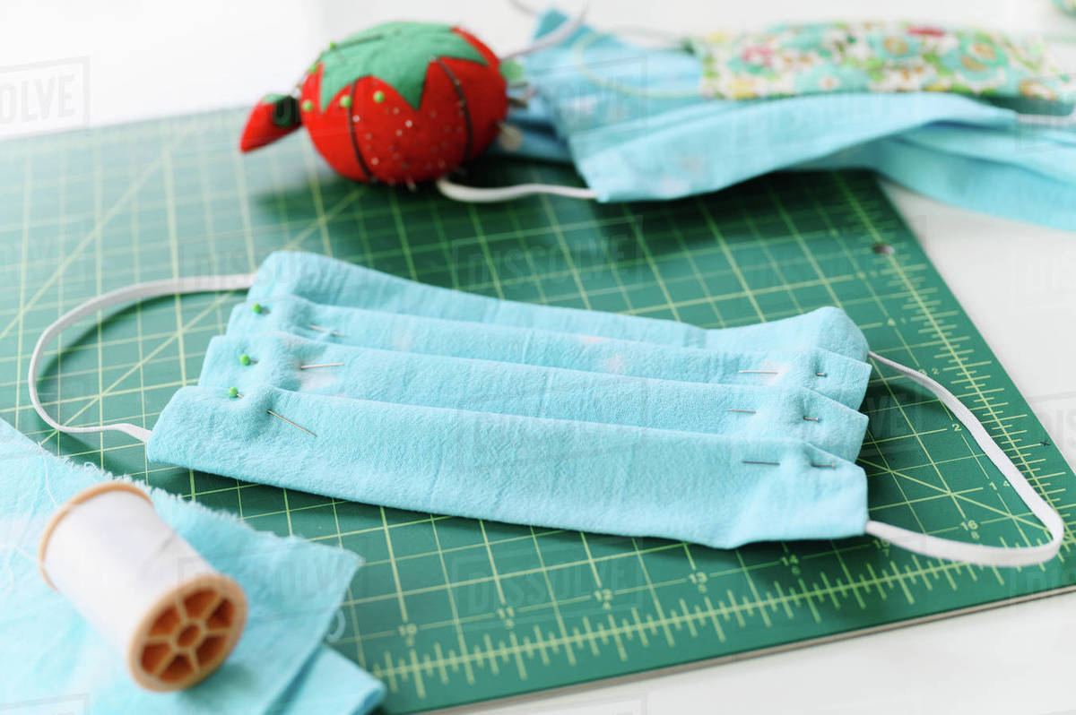 Making homemade cloth face masks - Stock Photo - Dissolve
