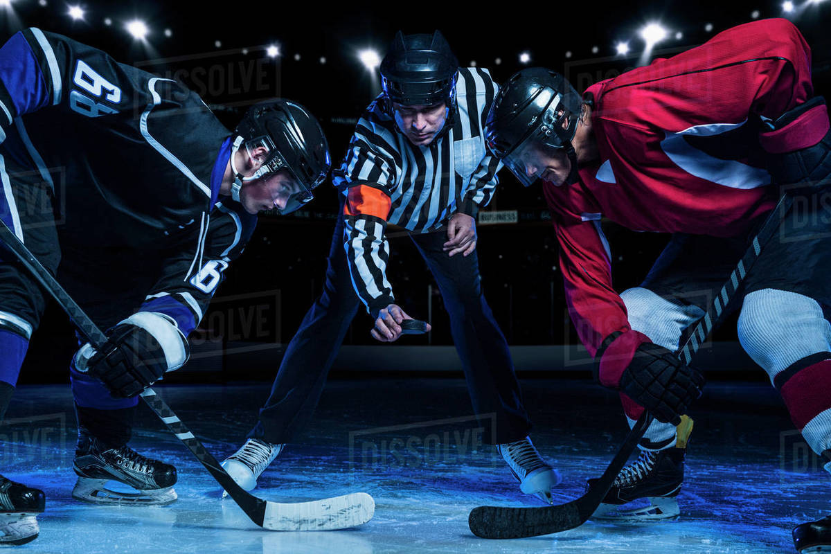 Hockey players and referee starting match - Royalty-free Stock Photo ...