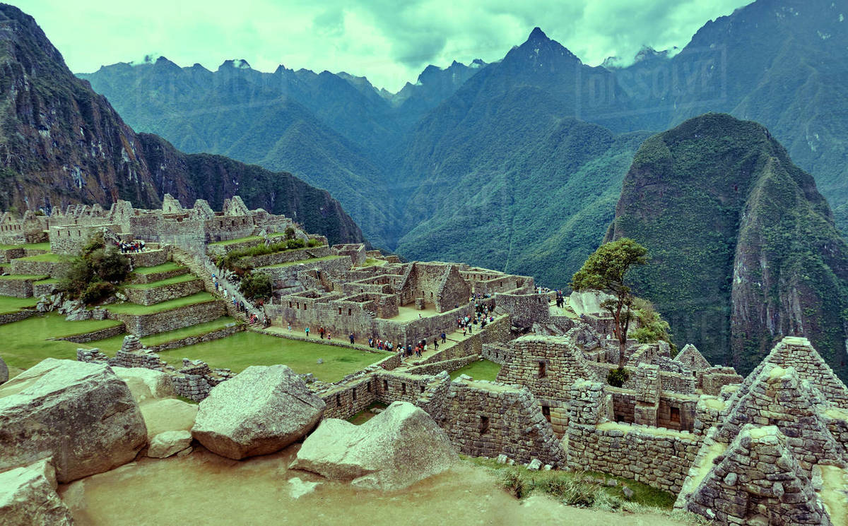 Peru, Machu Pichu, View of Machu Pichu and ruins of aztec village ...