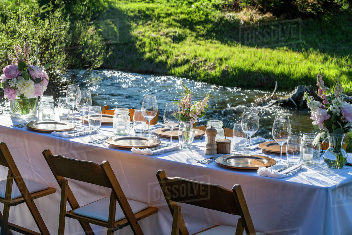 Outdoor dinner table setting - Royalty-free Stock Photo | Dissolve