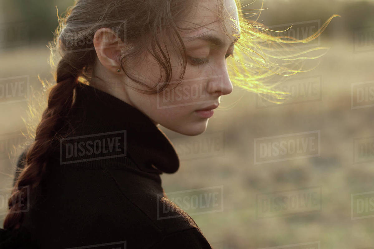 Russia, Omsk, Portrait of young woman in field - Royalty-free Stock ...