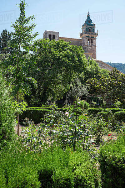 Monastery in garden - Stock Photo - Dissolve