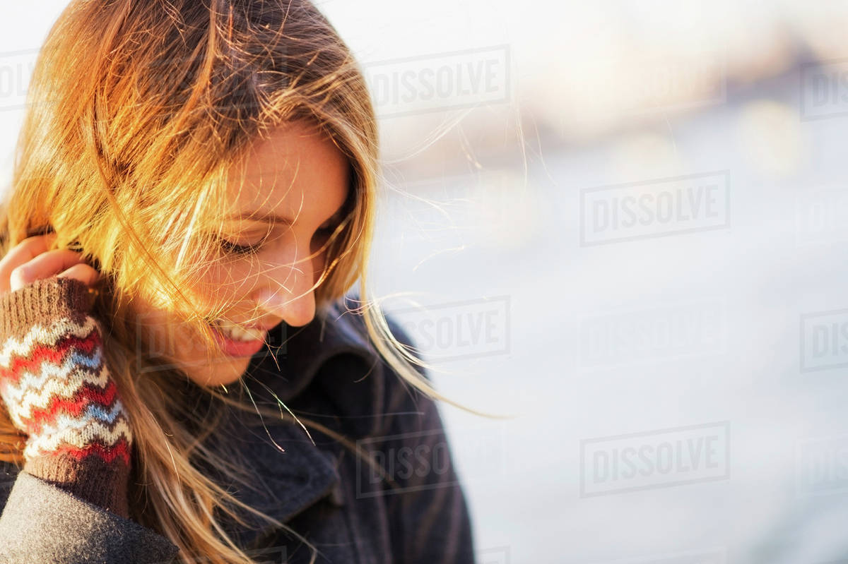 Portrait of woman in sunlight - Royalty-free Stock Photo | Dissolve