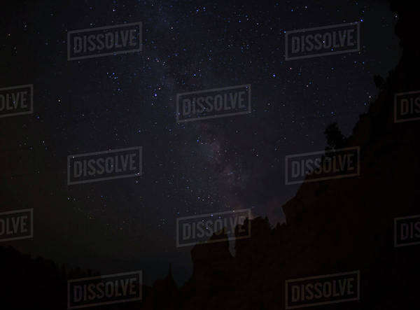 Night sky above rocks - Royalty-free Stock Photo | Dissolve