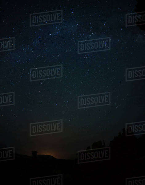 Night sky above rocks - Royalty-free Stock Photo | Dissolve