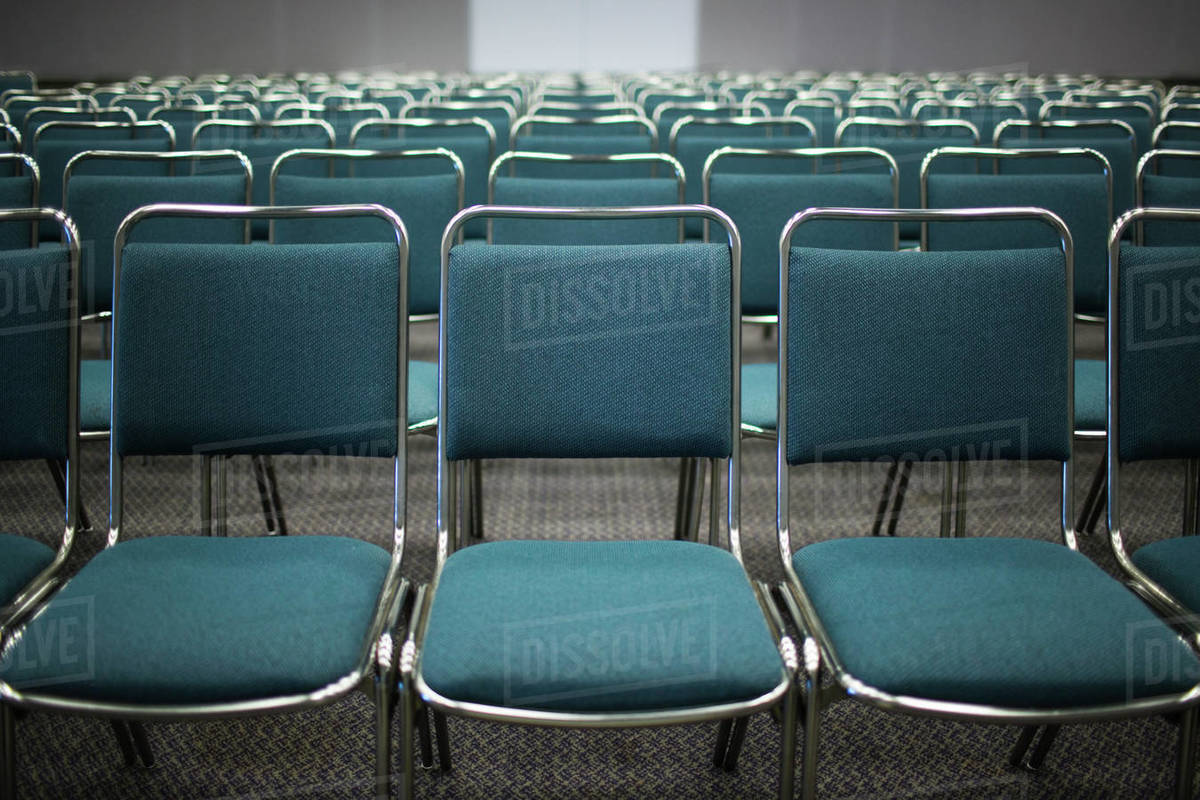 Rows of empty blue chairs in conference room - Royalty-free Stock Photo ...