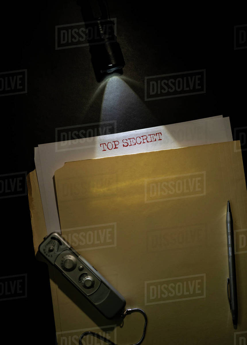 Overhead view of top secret documents on desk top - Royalty-free Stock ...