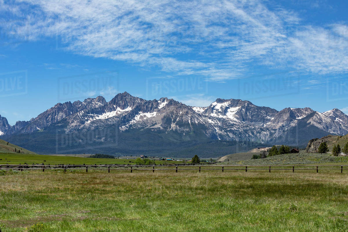 USA, Idaho, Stanley, Landscape with pastures and Sawtooth Mountains ...