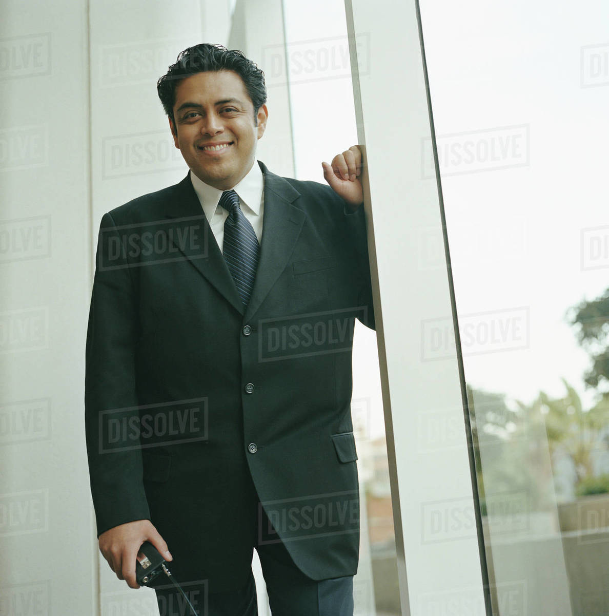 Portrait of smiling building security guard - Royalty-free Stock Photo ...