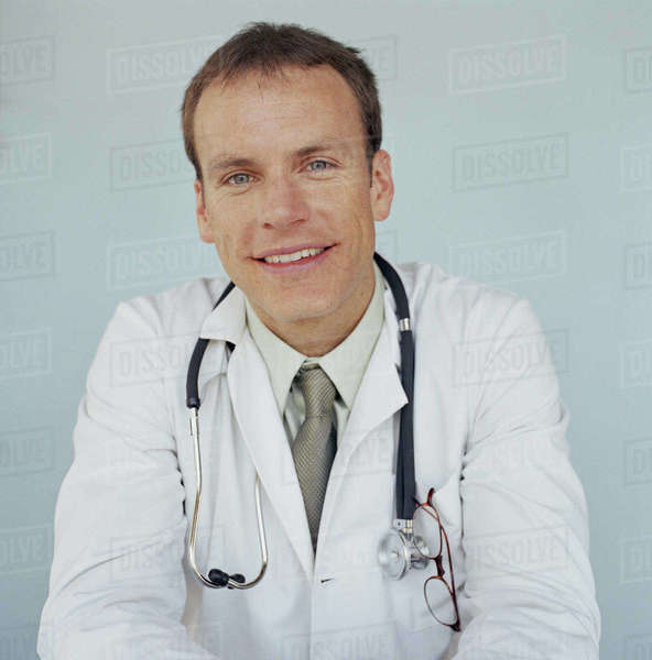 Portrait of male doctor with stethoscope - Royalty-free Stock Photo ...