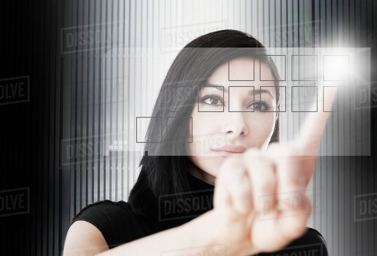 Woman touching screen button - Stock Photo - Dissolve