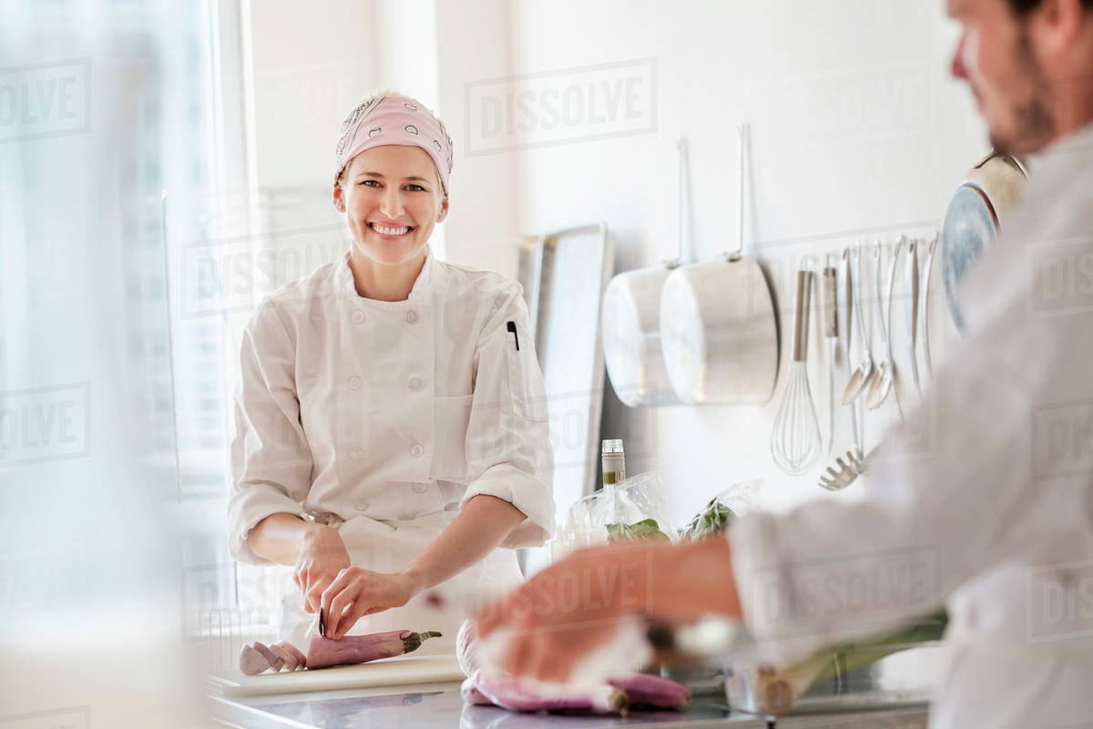 Chefs working in kitchen - Royalty-free Stock Photo | Dissolve
