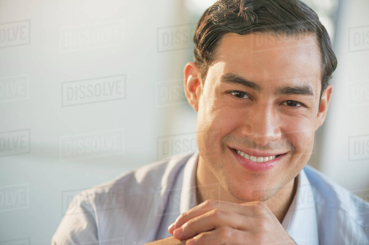 Portrait of smiling male executive in office - Royalty-free Stock Photo ...