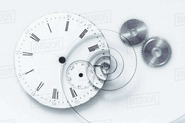 Clock cogs and coiled spring - Royalty-free Stock Photo | Dissolve