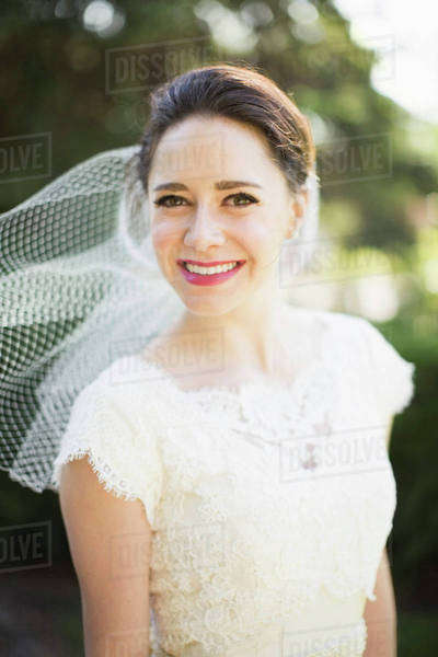 Portrait of smiling bride - Royalty-free Stock Photo | Dissolve