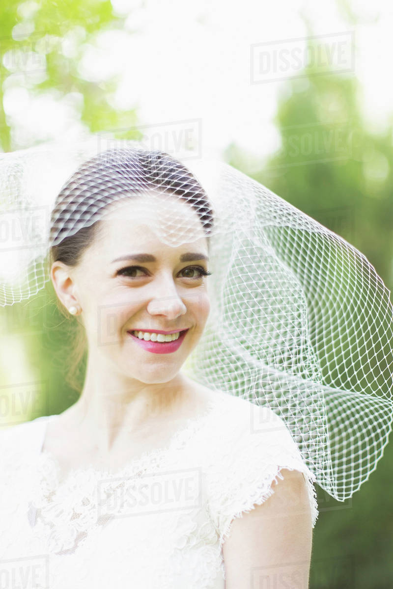 Portrait of smiling bride - Royalty-free Stock Photo | Dissolve