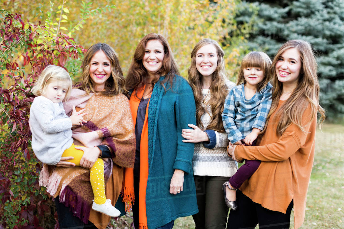 Portrait of smiling women with children (2-3, 4-5) - Royalty-free Stock ...